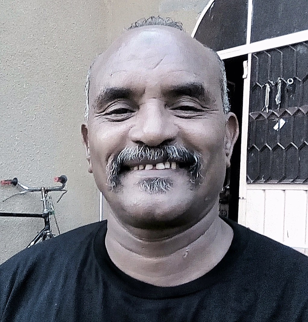 Shabak Ahmed: eyes, hair, 63 years old | ID1457784